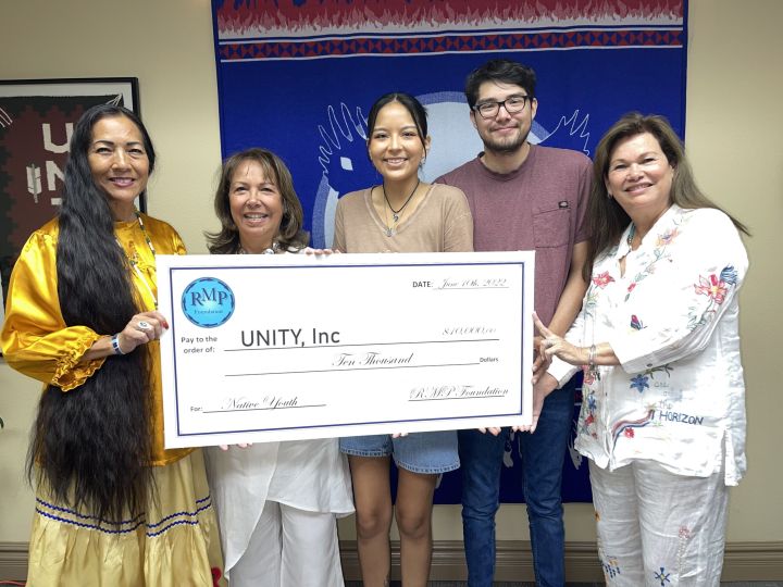 Tribal Tech presents check to UNITY – Unity, Inc.